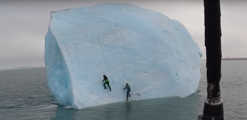 Video: Iceberg Rolls With Ice Climbers on It
